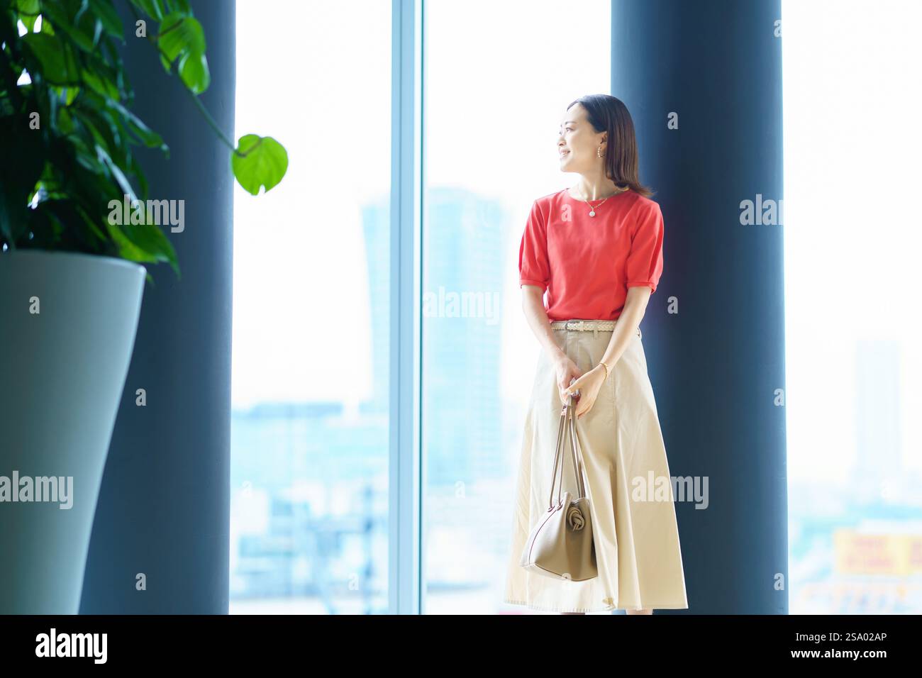 Woman commuting in office street Stock Photo - Alamy