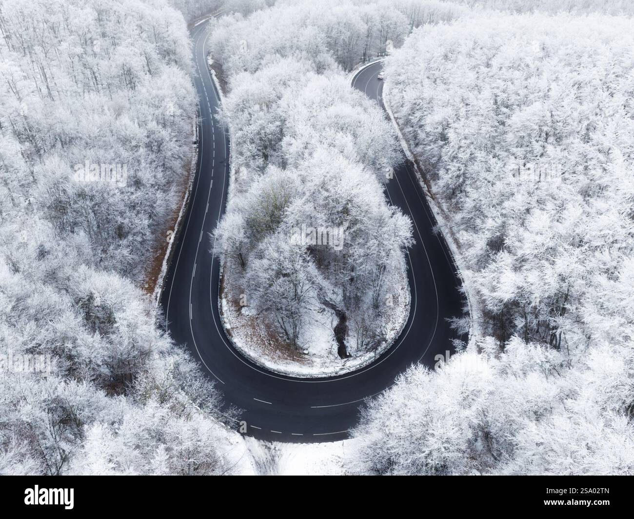 Winter Wonderland Aerial View: Snowy Streets Captured by Drone with ...