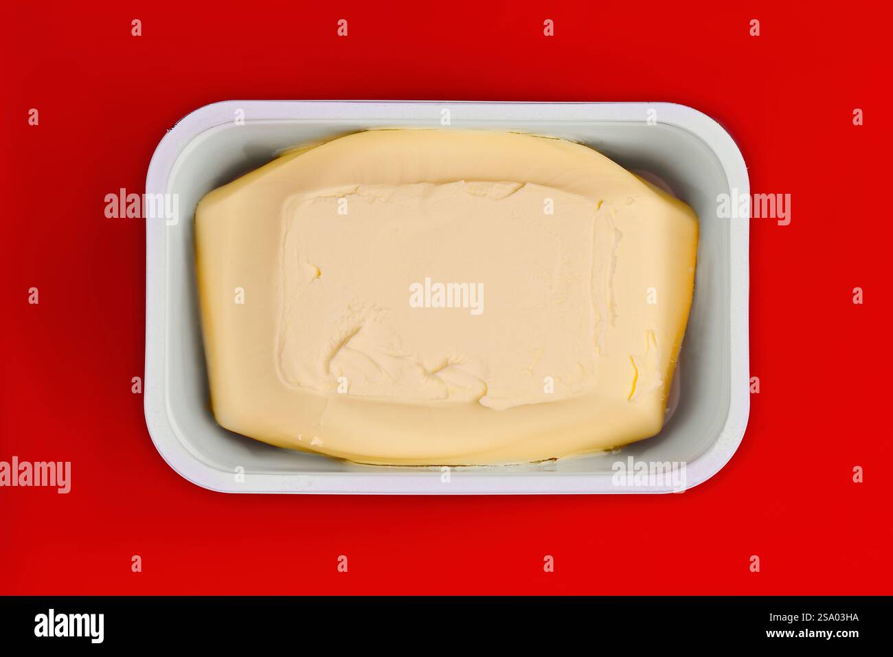 Just opened margarine box on red background. Seen direktly above Stock ...