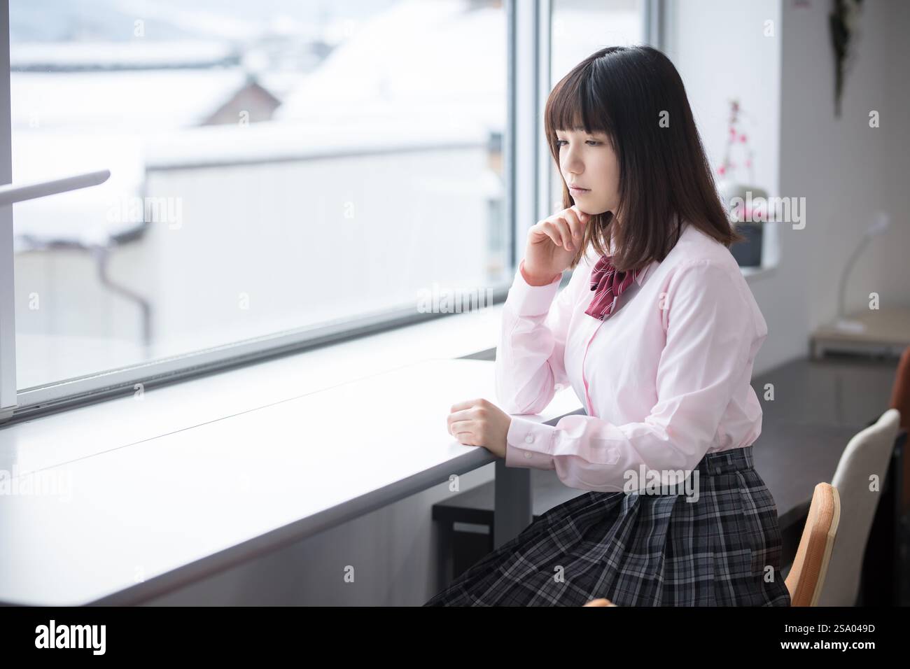 High school girl thinking in the classroom Stock Photo - Alamy