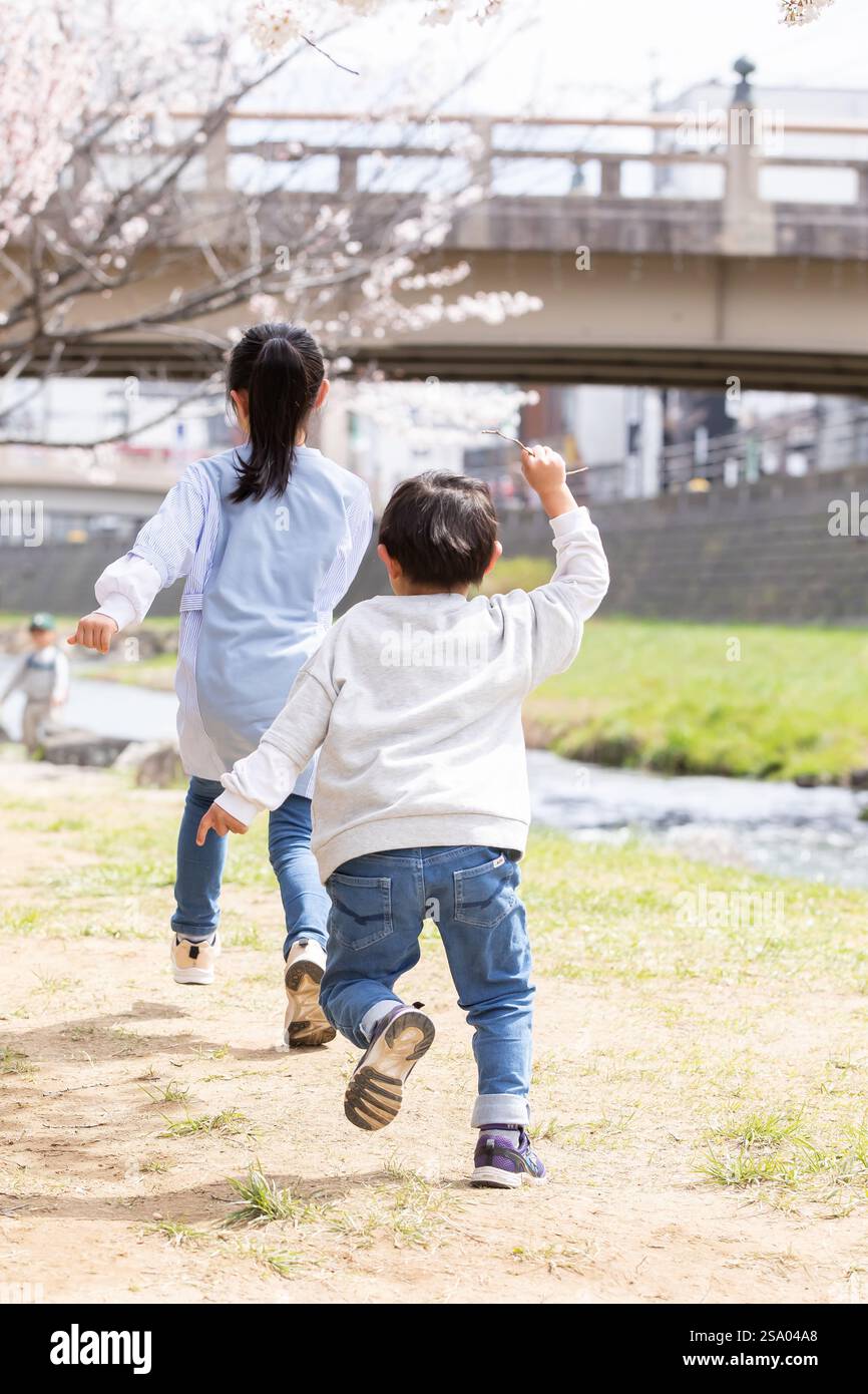 Children chasing each other PLAY Stock Photo - Alamy