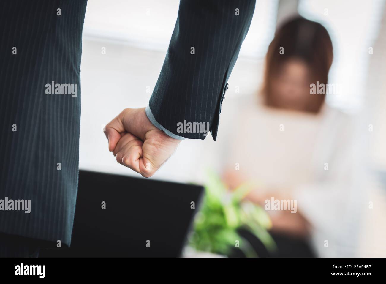 Fist of a businessman Anger Stock Photo - Alamy