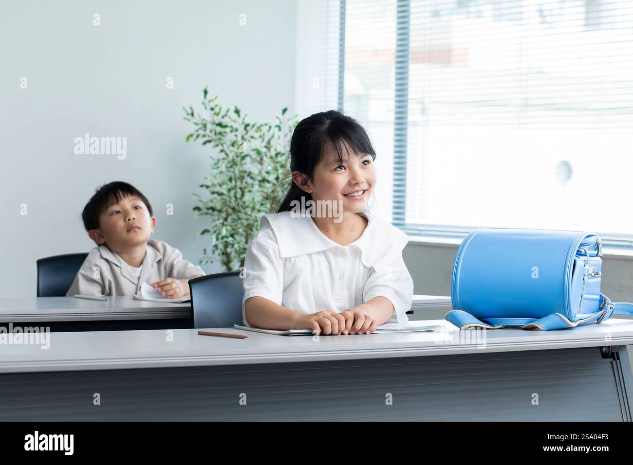 Primary schools student in class Stock Photo - Alamy