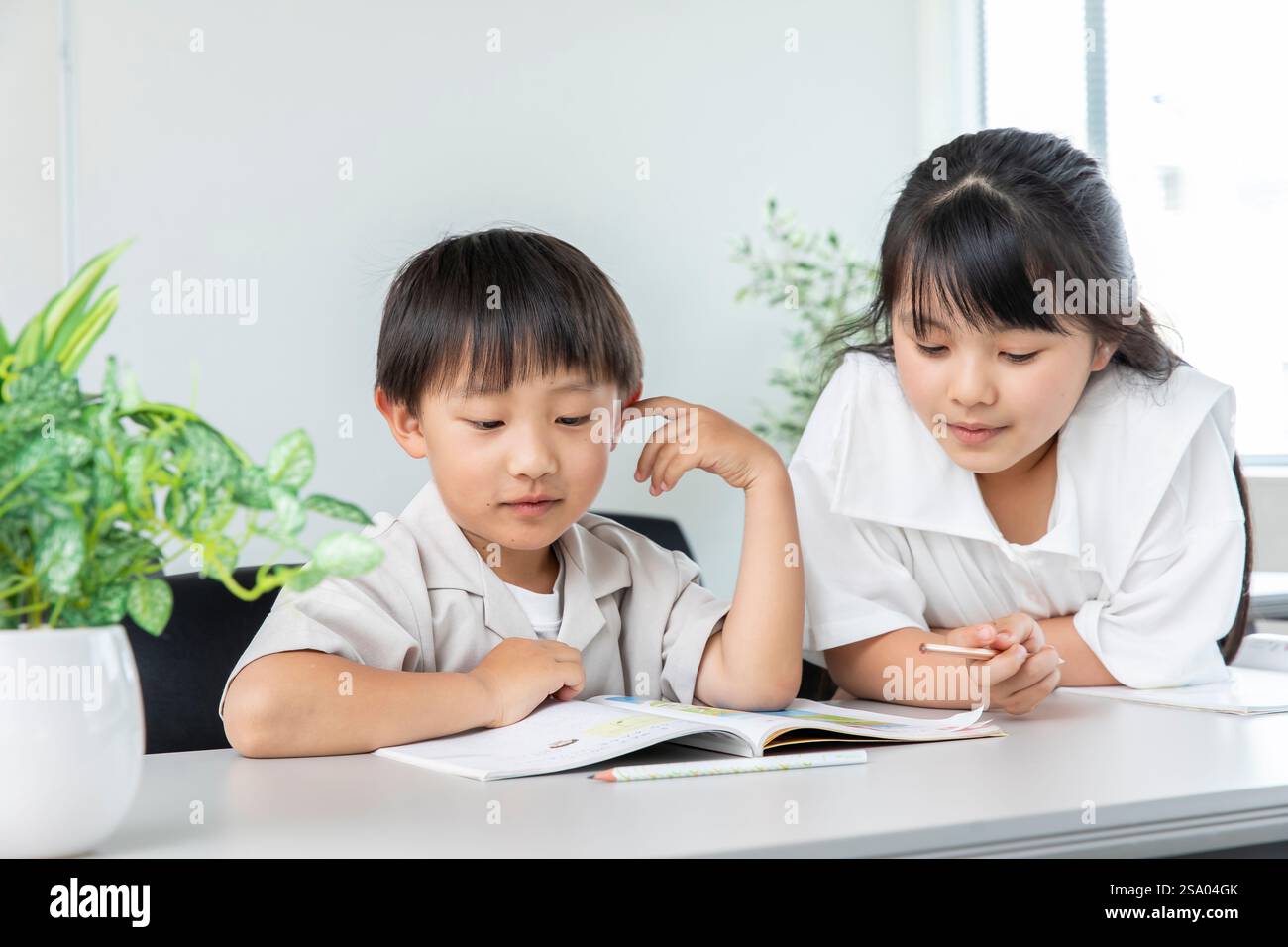 Primary schools student in class Stock Photo - Alamy
