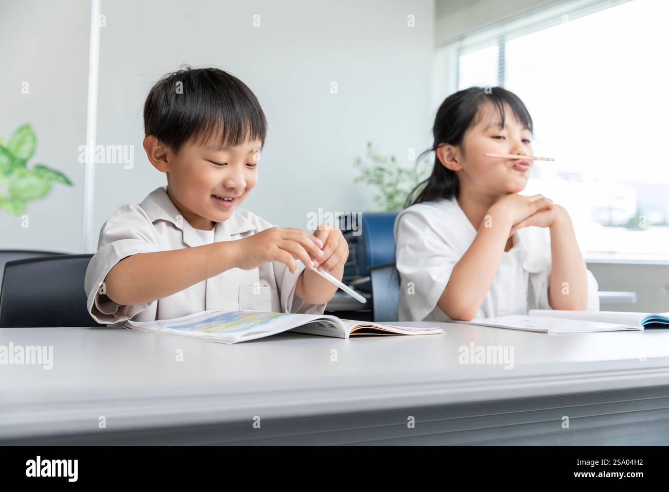 Happy first grade students classroom hi-res stock photography and ...