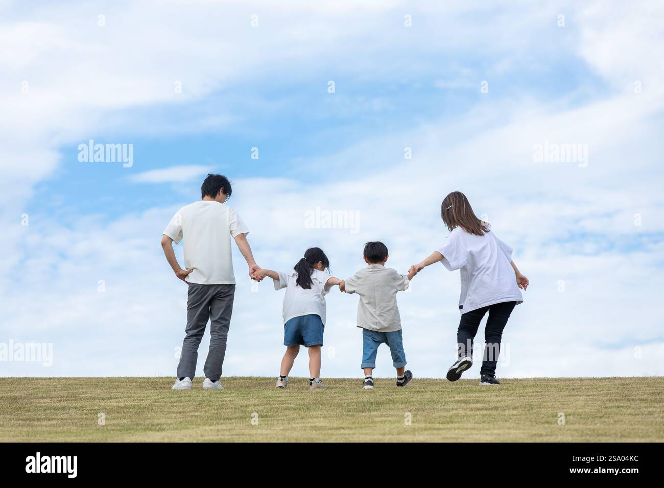 Family back view Stock Photo - Alamy