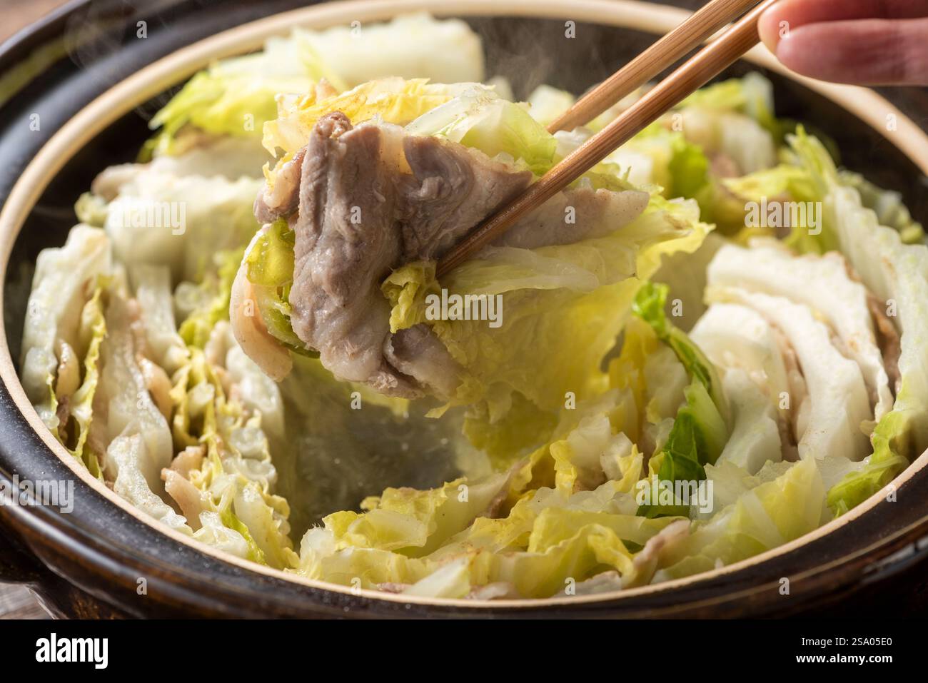 One-pot dish of Chinese cabbage and pork belly Stock Photo - Alamy