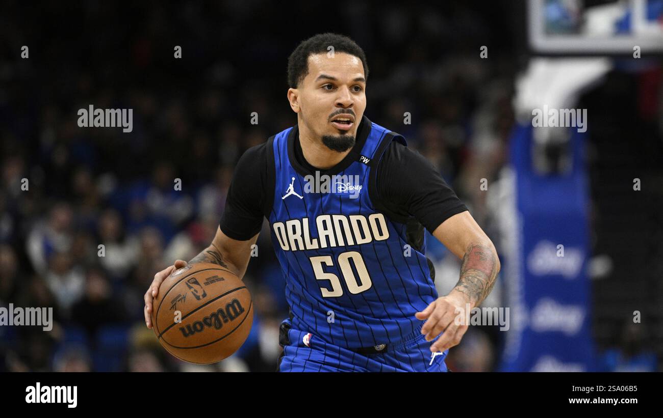 Orlando Magic guard Cole Anthony (50) brings the ball up the court ...