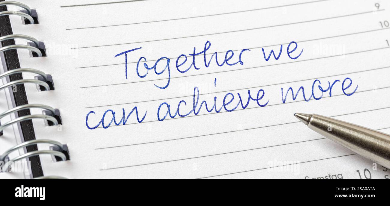 Together we can achieve more written on a calendar page Stock Photo - Alamy