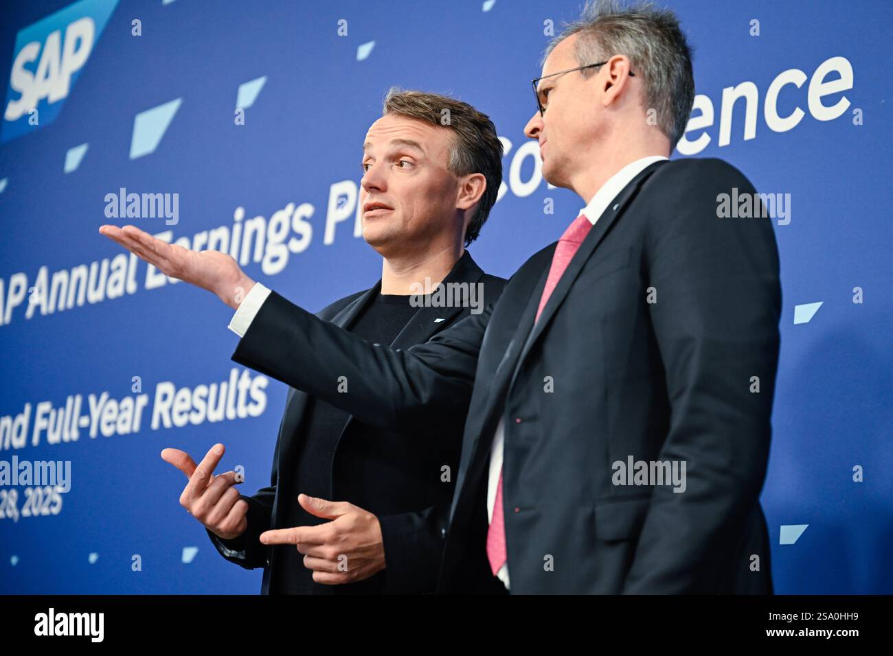 28 January 2025, Baden-Württemberg, Walldorf: Christian Klein (l), CEO ...