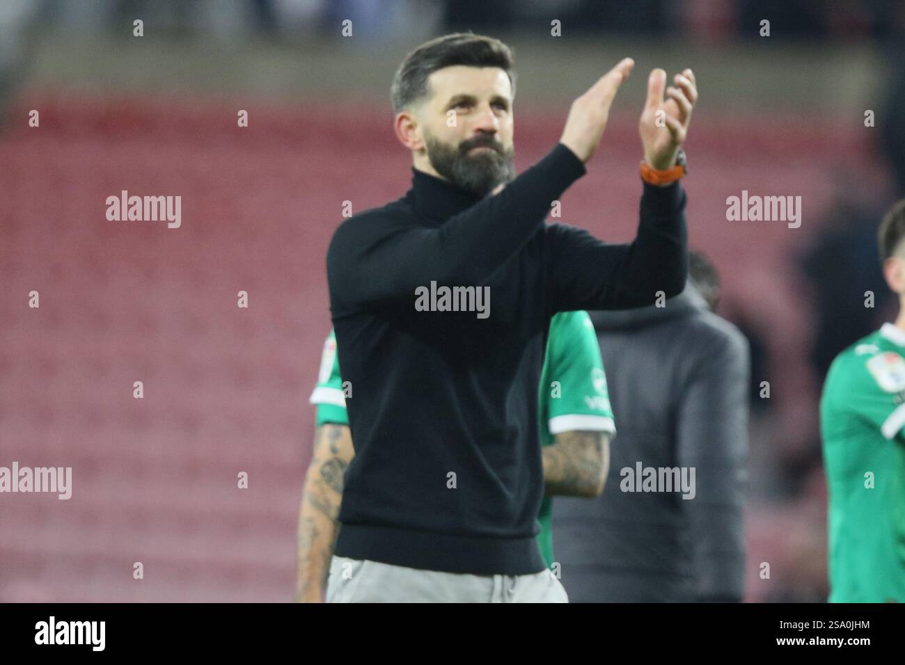 Manager of Plymouth Argyle, Miron Muslic applauds travelling fans after ...