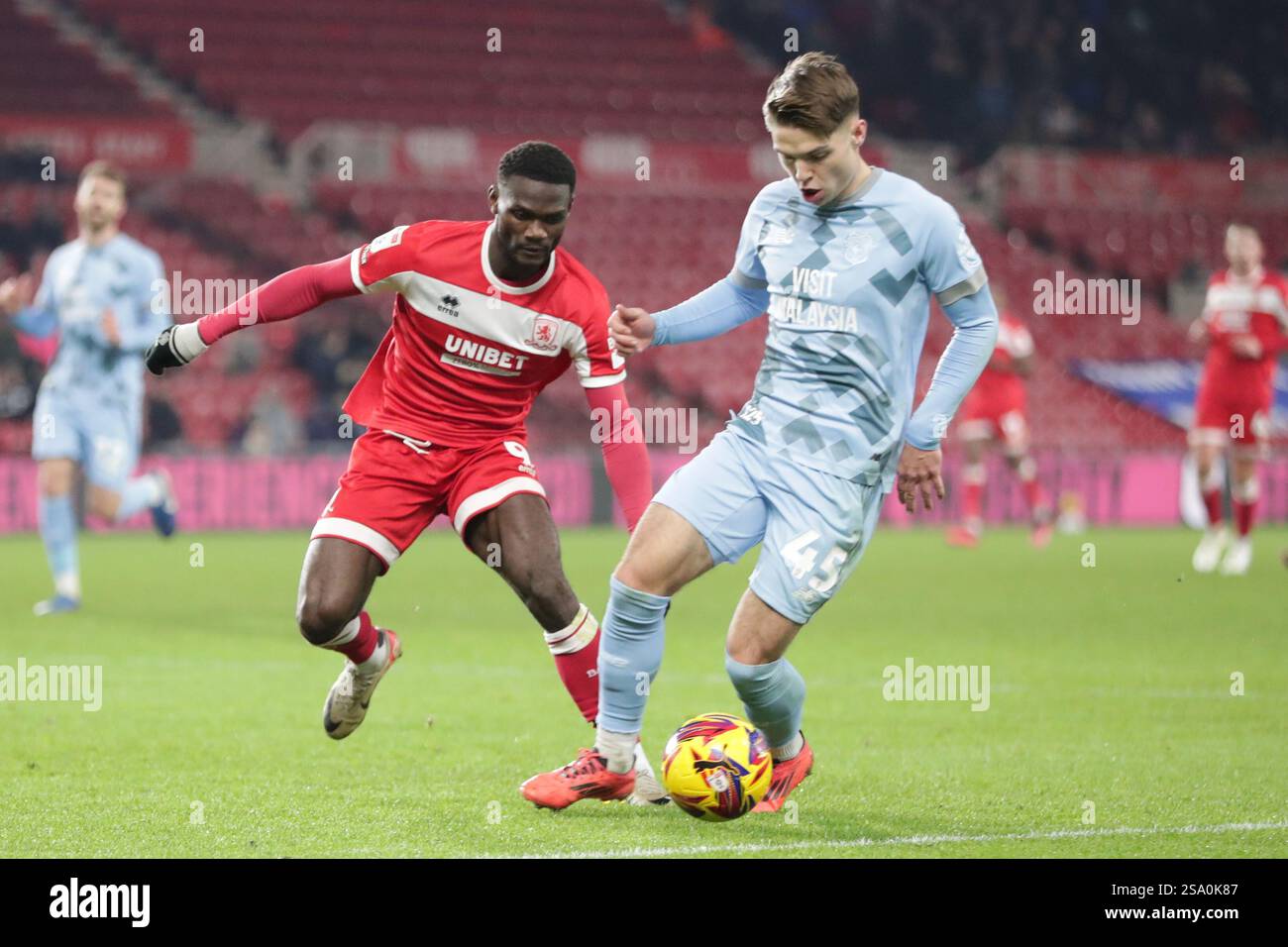 Cian Ashford of Cardiff City battles Emmanuel Latte of Middlesbrough ...