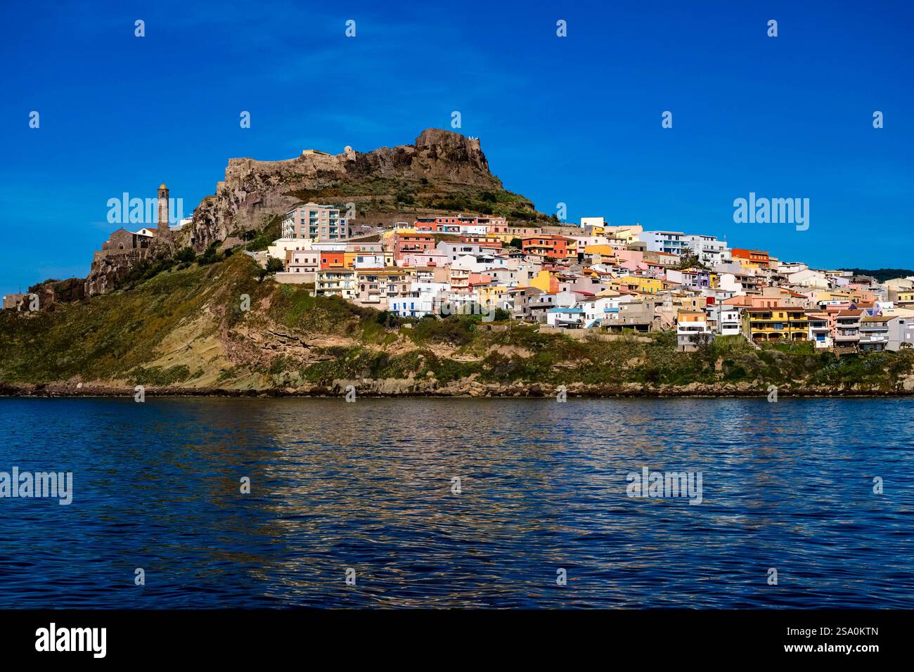 Houses in the coastal town of Castelsardo, grouped around a hill with ...