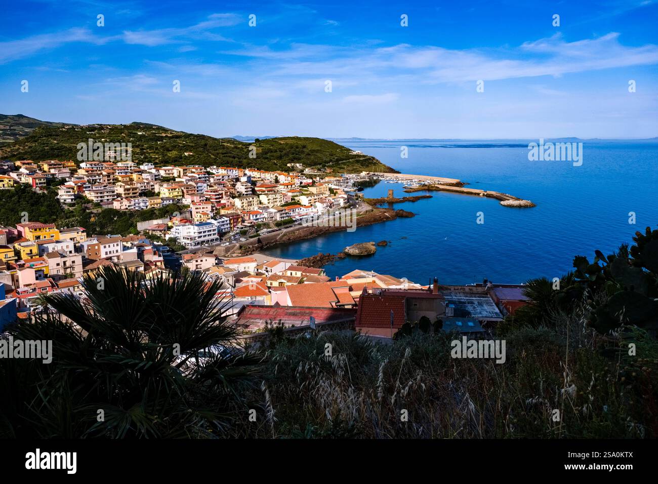 Aerial view of the houses, harbour and marina of the coastal town of ...