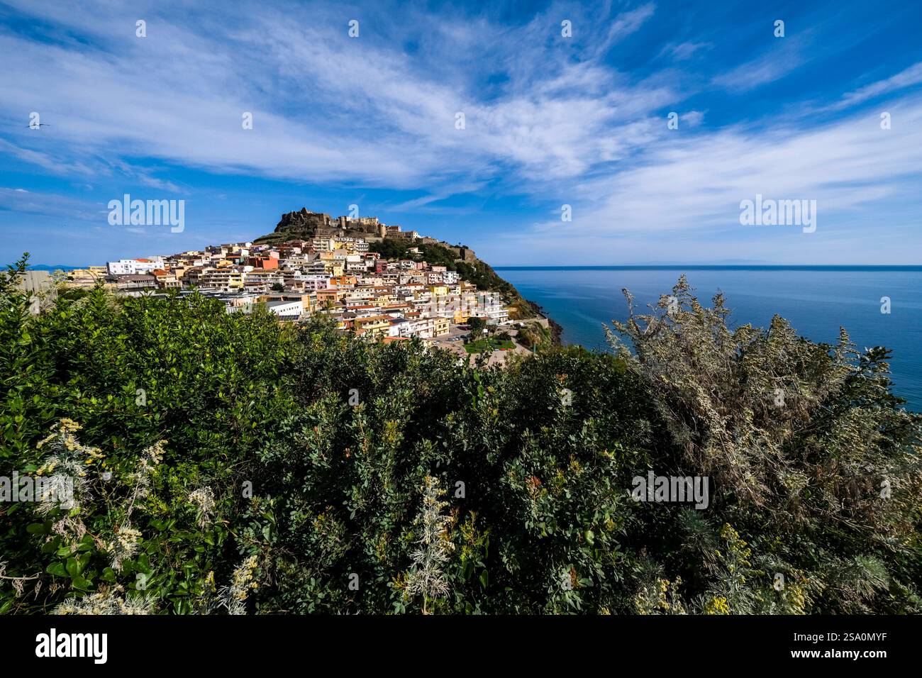 Houses in the coastal town of Castelsardo, grouped around a hill with ...