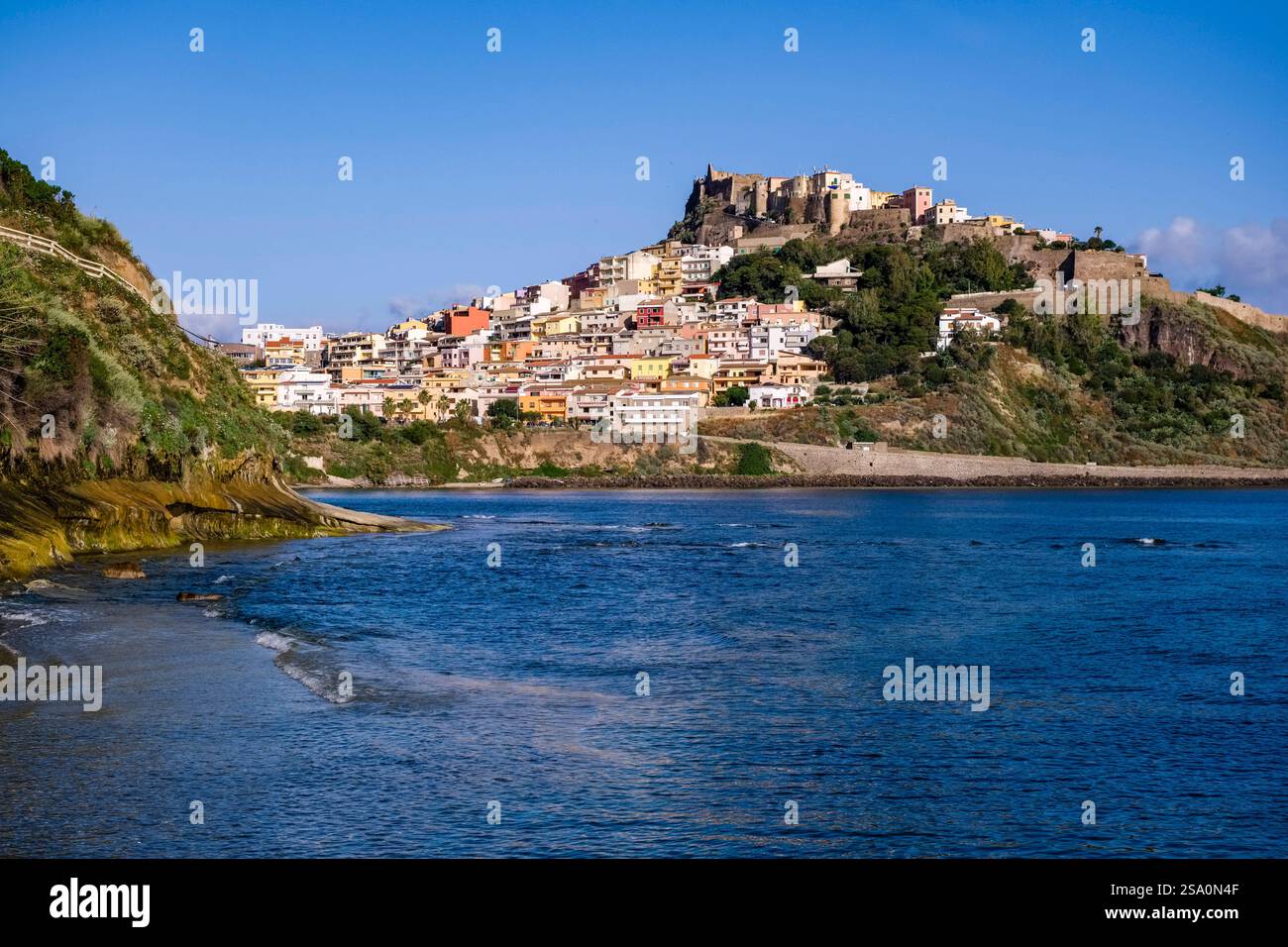Houses in the coastal town of Castelsardo, grouped around a hill with ...