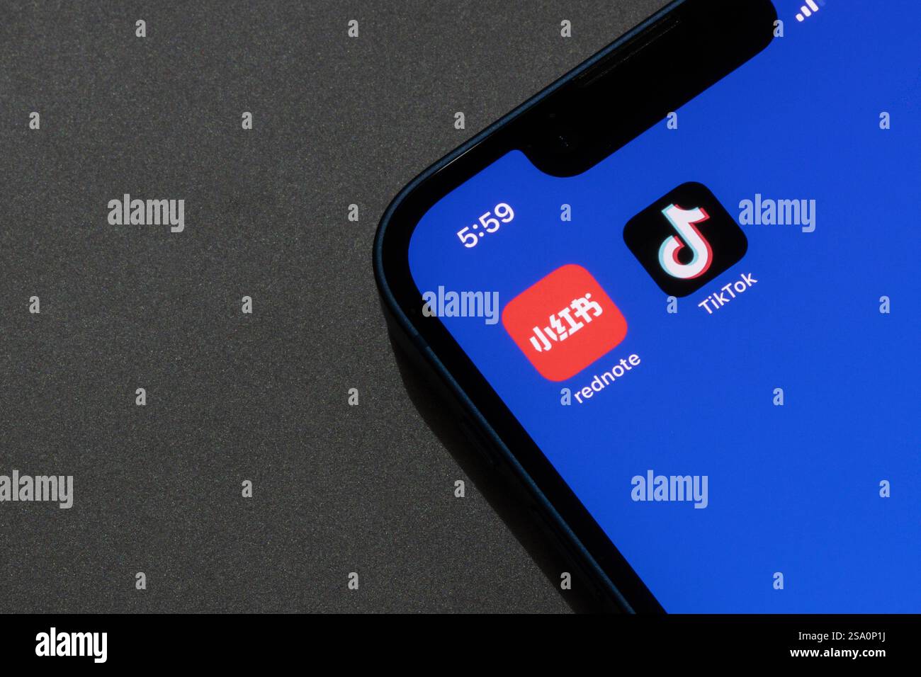 Rednote (also known as Xiaohongshu) and TikTok app icons are seen on ...