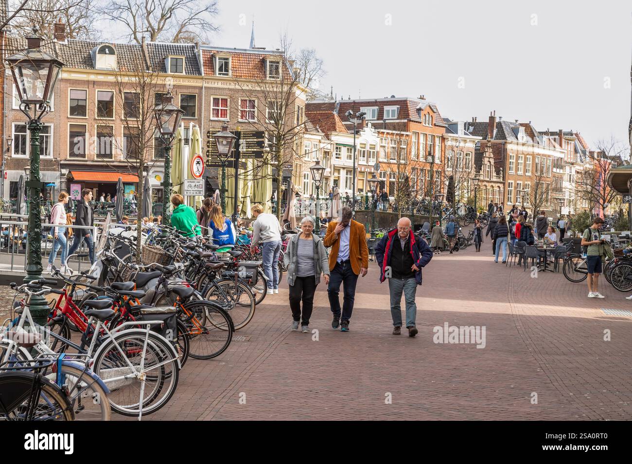 People walk through the center of the Dutch city of Leiden Stock Photo ...