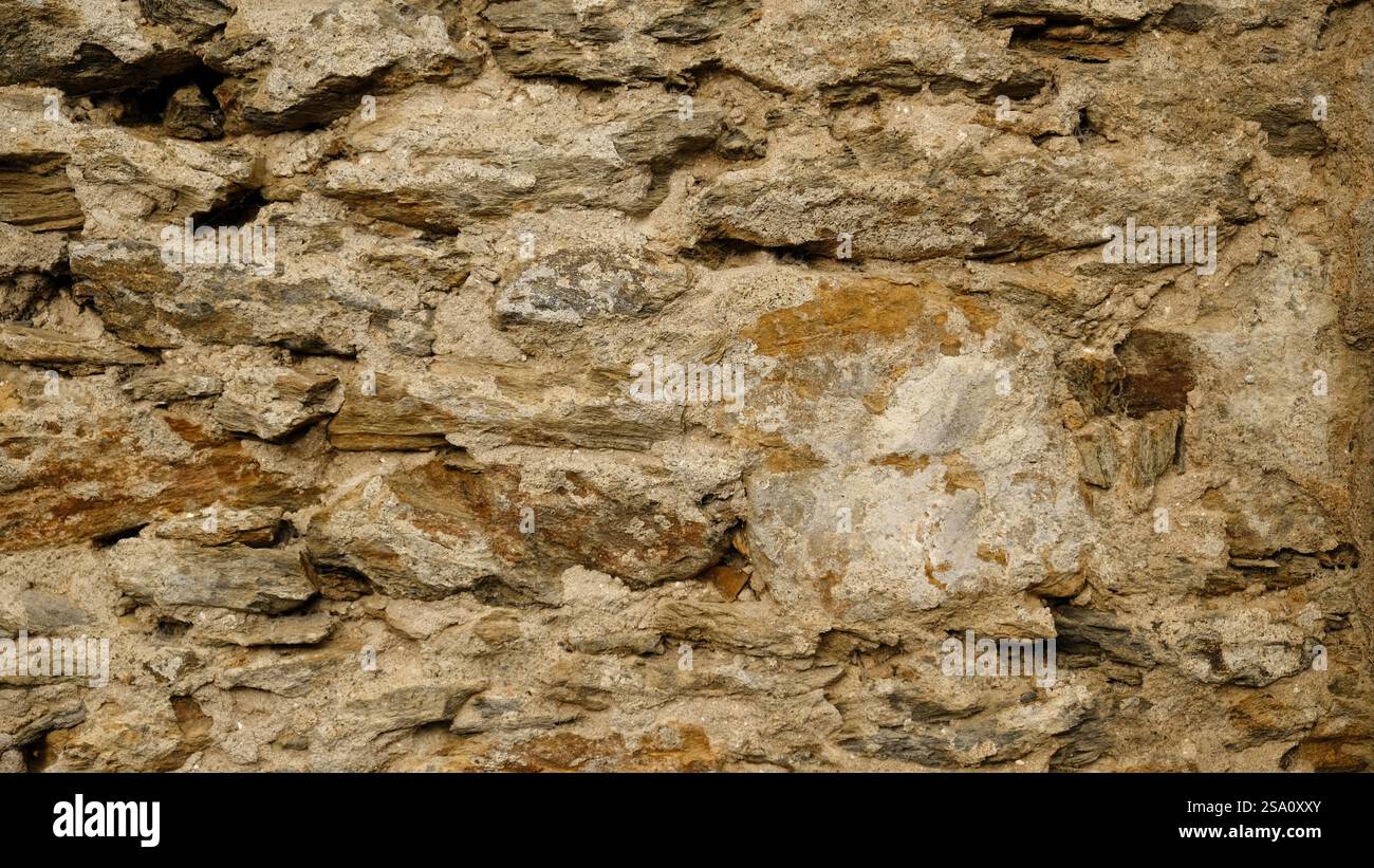 Texture of beige stone wall with rough masonry and uneven surface ...
