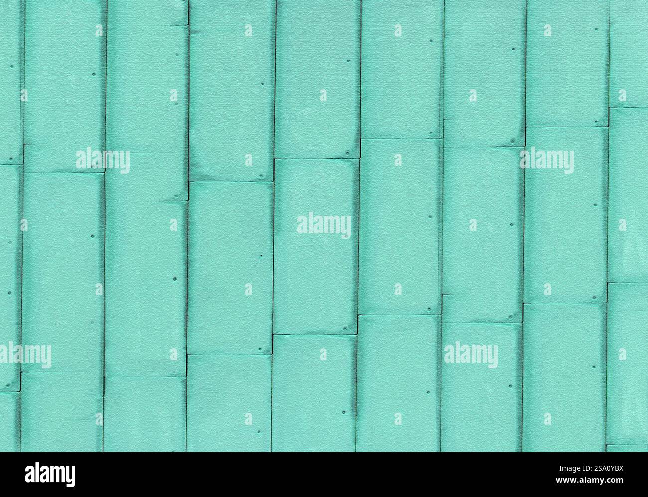 Turquoise copper wall cladding creating modern architectural design ...