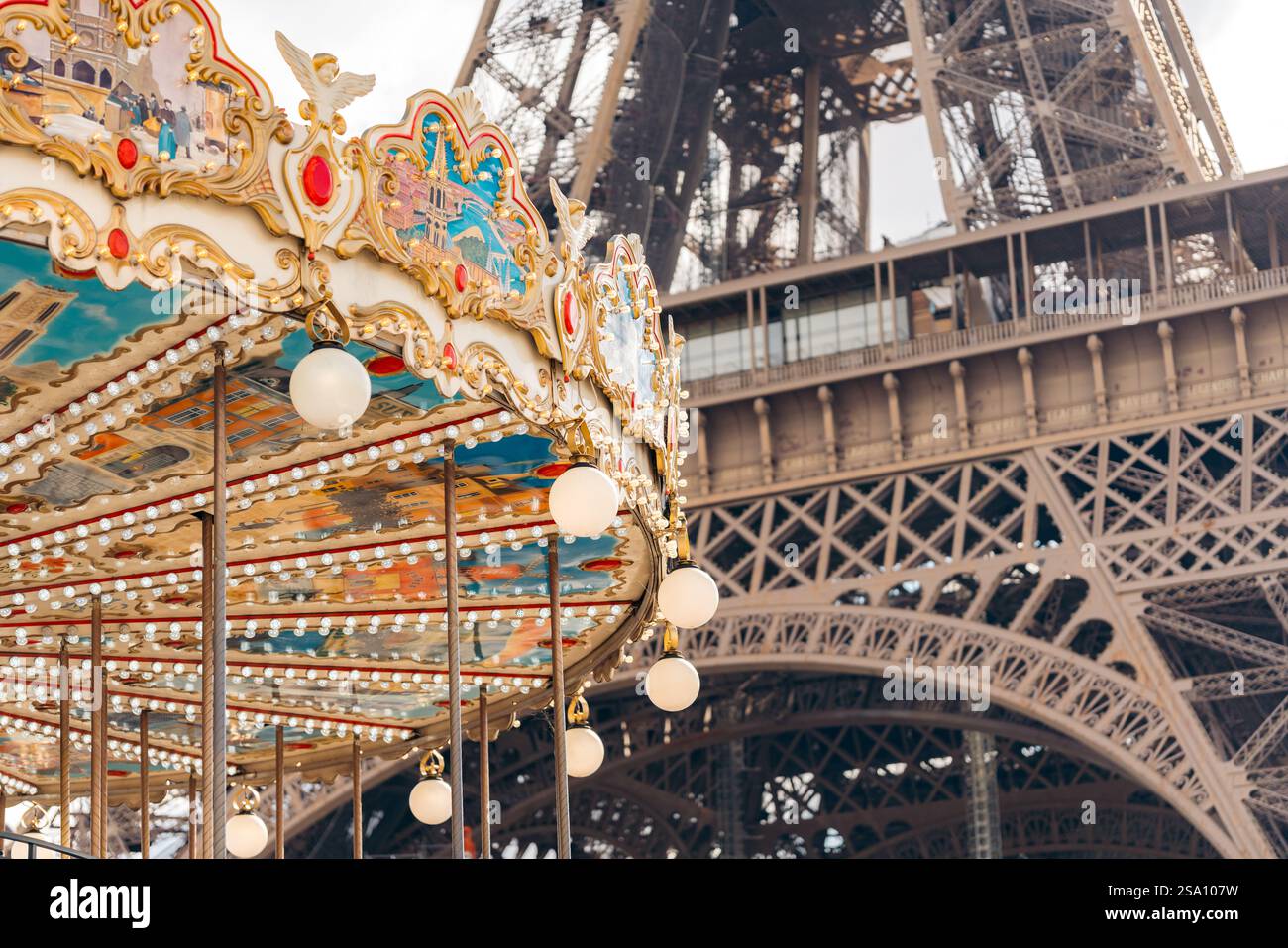 Carousel near Eiffel Tower, Paris. Fun, Parisian charm Stock Photo - Alamy