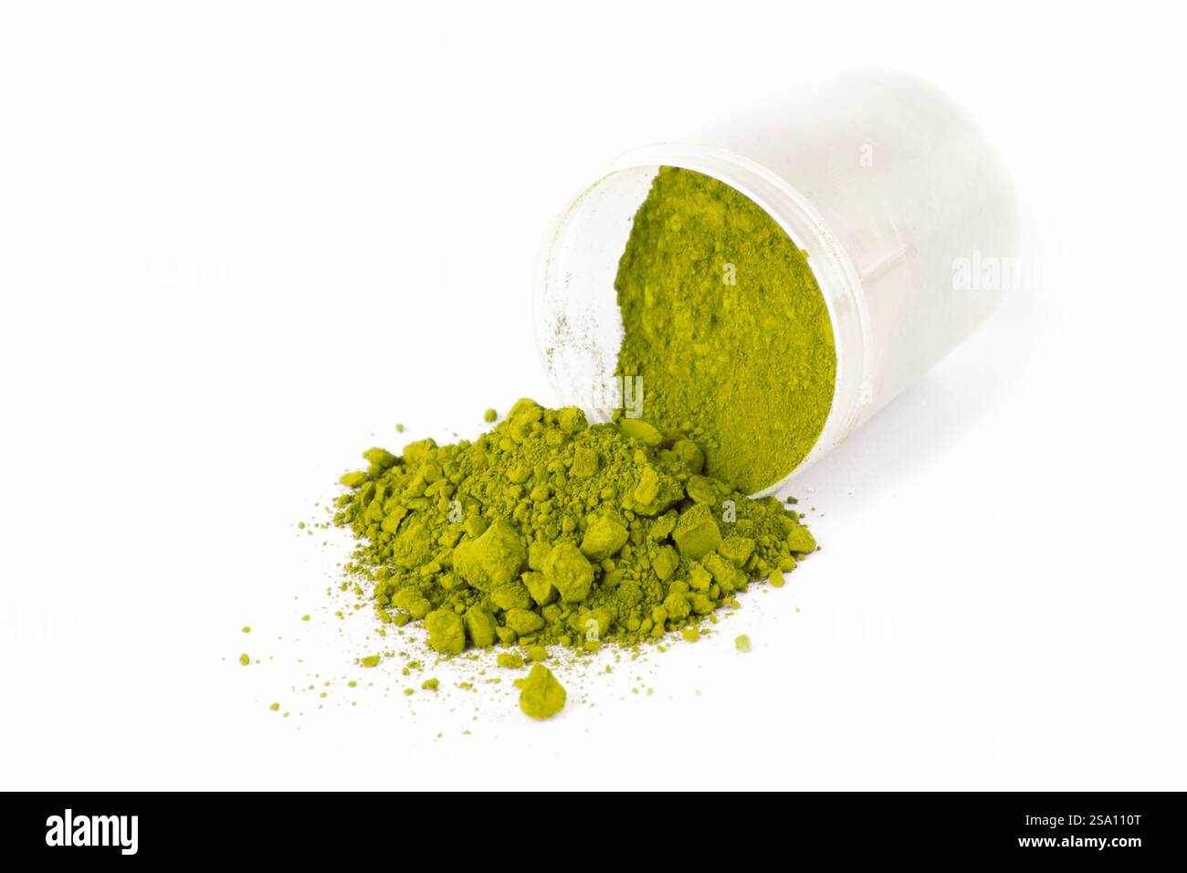 Green Powder Spills From a White Container on a White Background Stock ...
