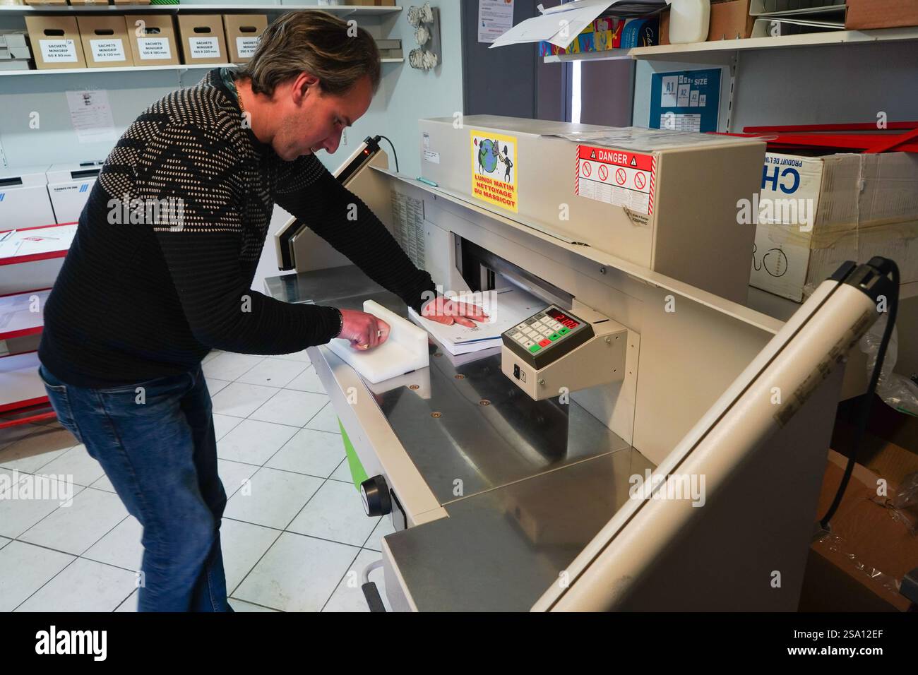 Disabled worker working in the printing, reprography and marking ...
