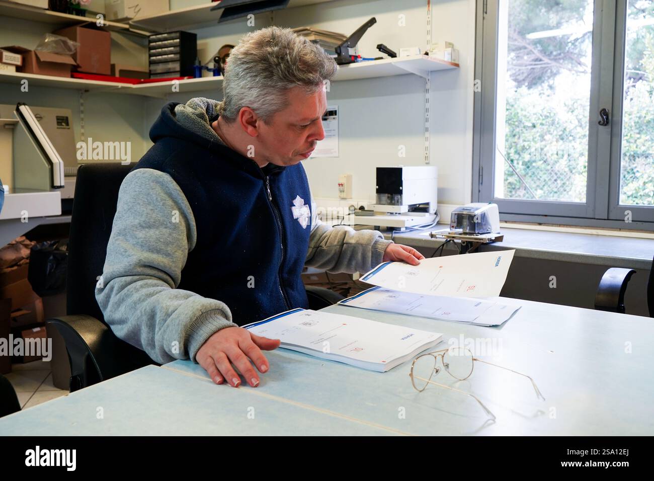 Disabled worker working in the printing, reprography and marking ...