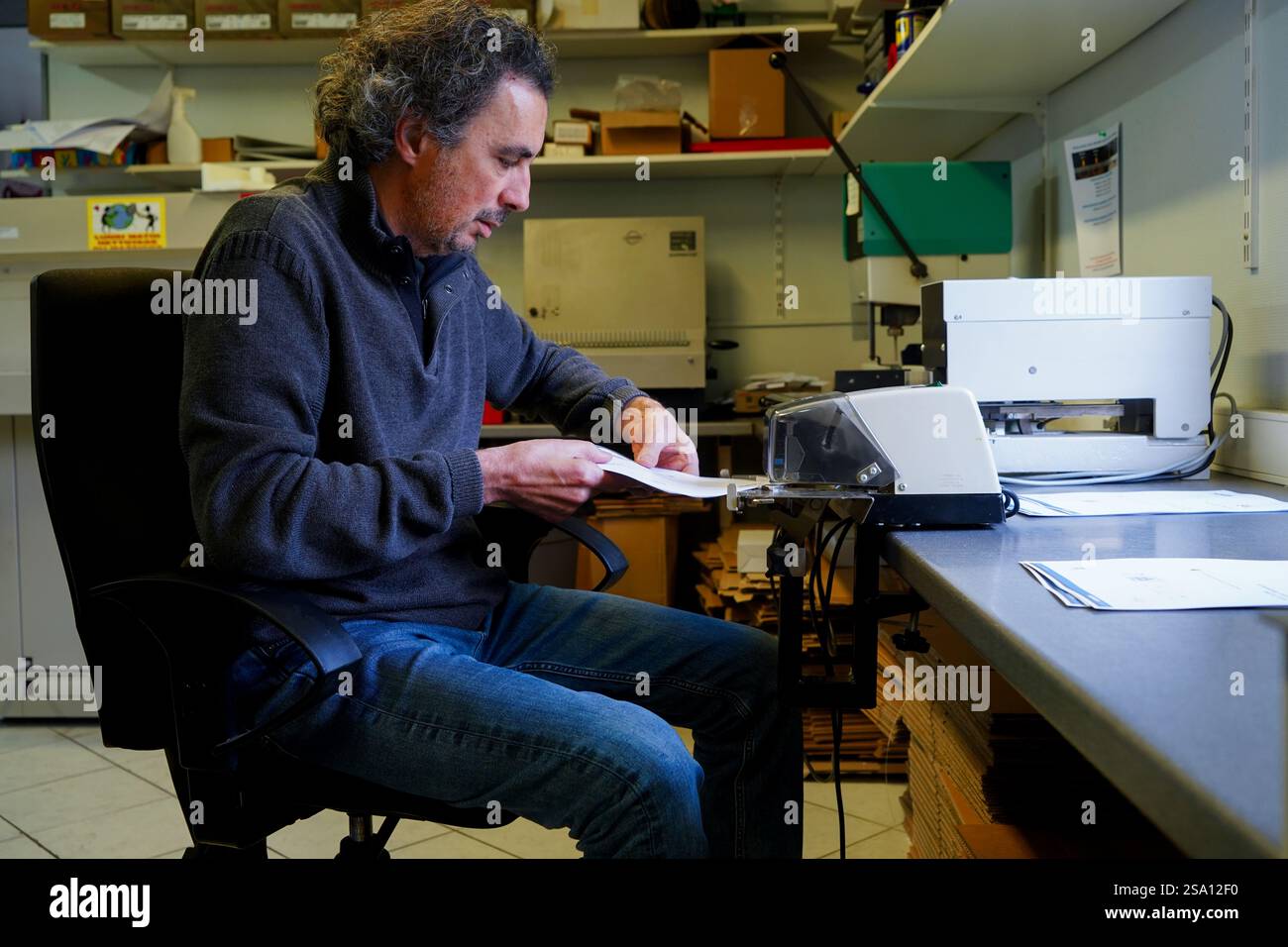 Disabled worker working in the printing, reprography and marking ...