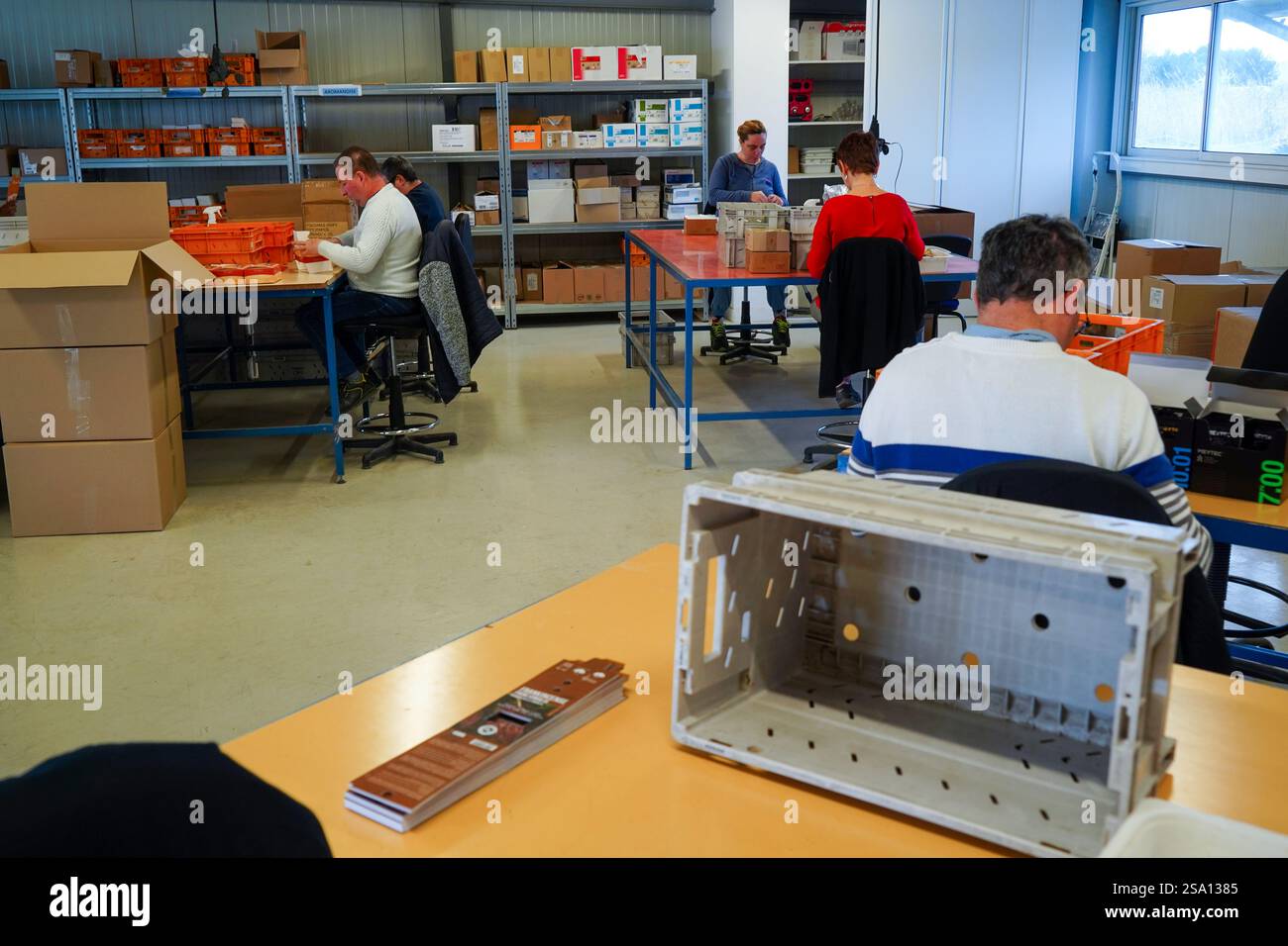 Disabled workers working in the ESAT product packaging workshop Stock ...