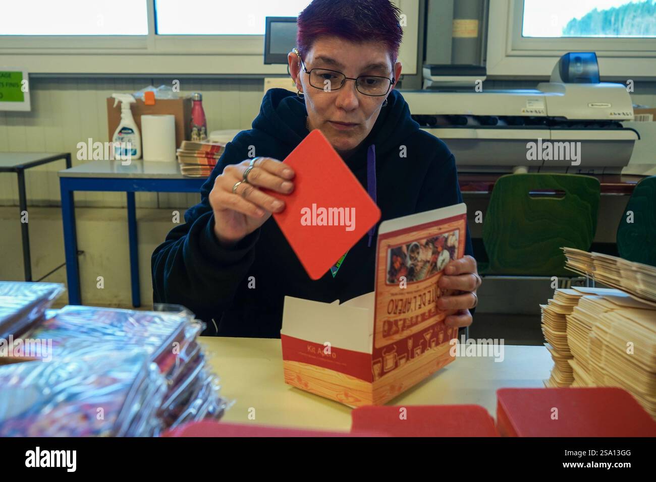 Disabled worker working in the ESAT product packaging workshop ...