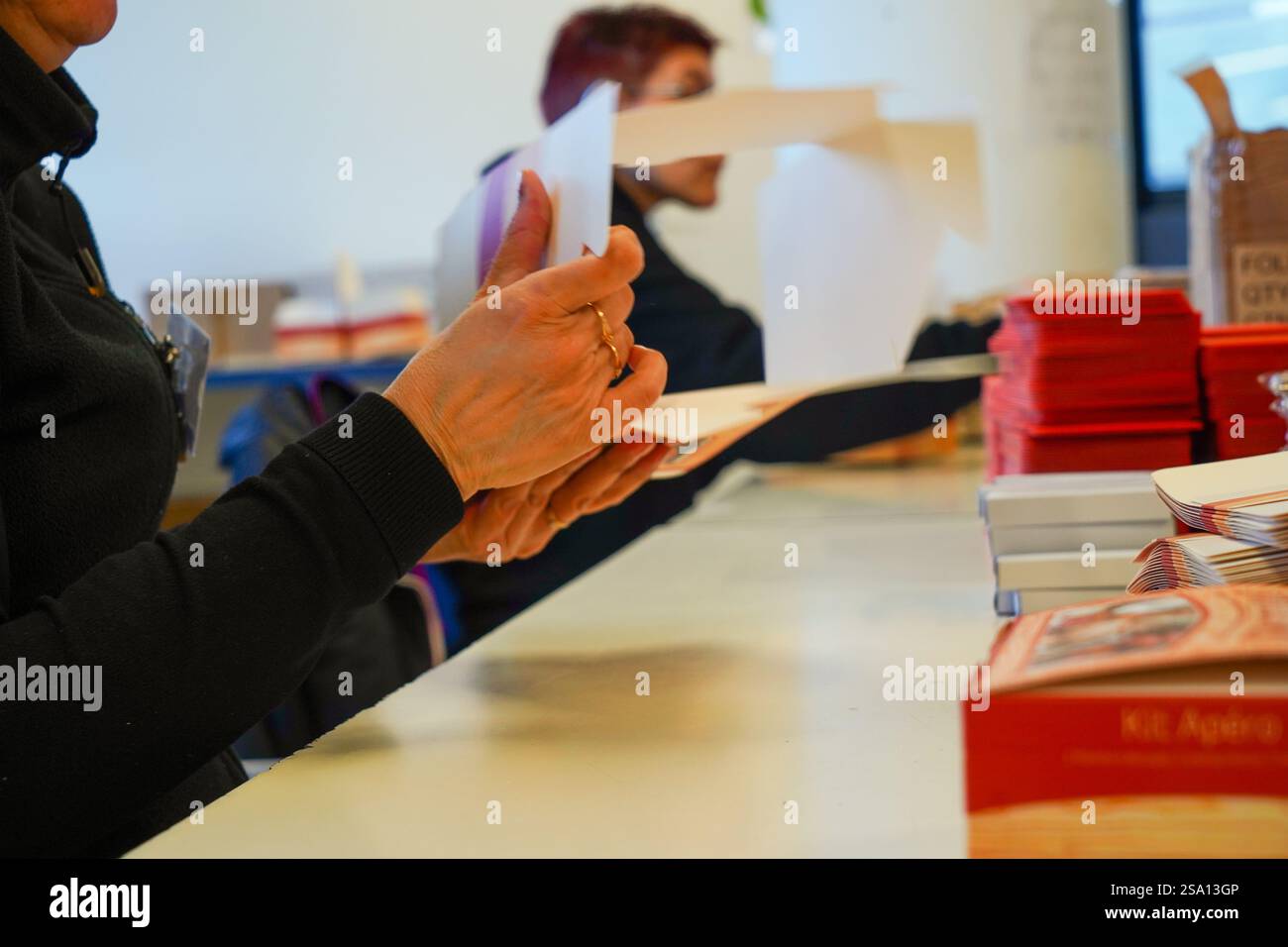 Disabled worker working in the ESAT product packaging workshop ...