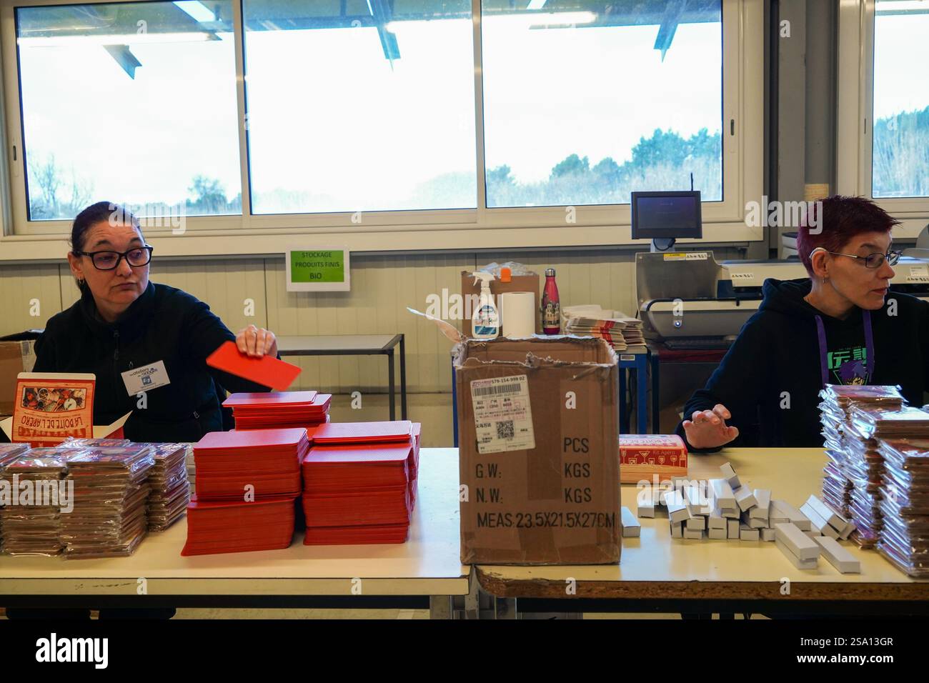 Disabled worker working in the ESAT product packaging workshop ...