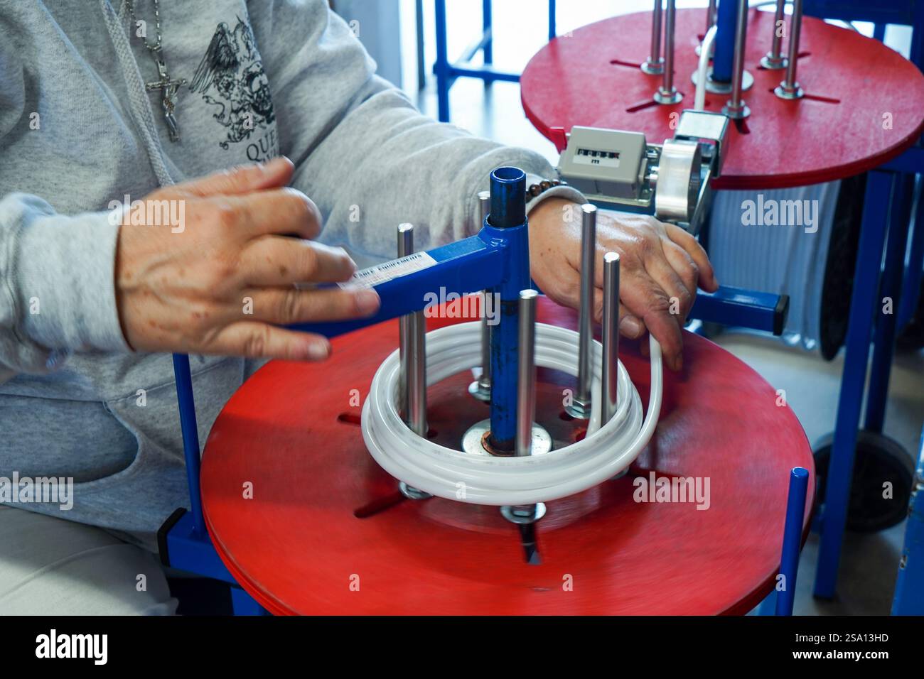 Disabled worker working in the ESAT product packaging workshop ...
