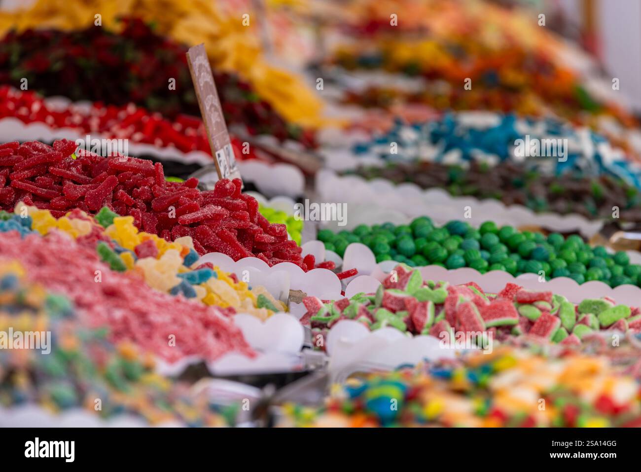 Assortment of sweets offered at a market stall Stock Photo - Alamy