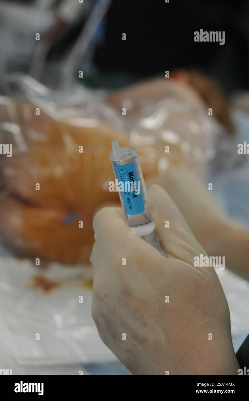 Morphine injection into a child's spine Stock Photo - Alamy