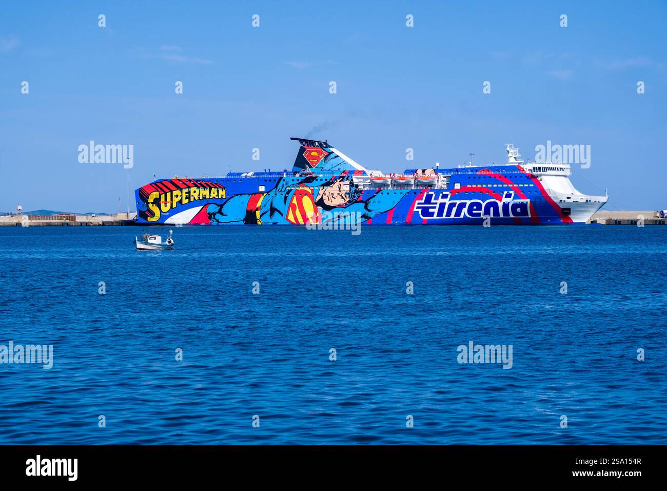 The ferry boat Athara of Tirrenia Lines at anchor in the harbour of ...