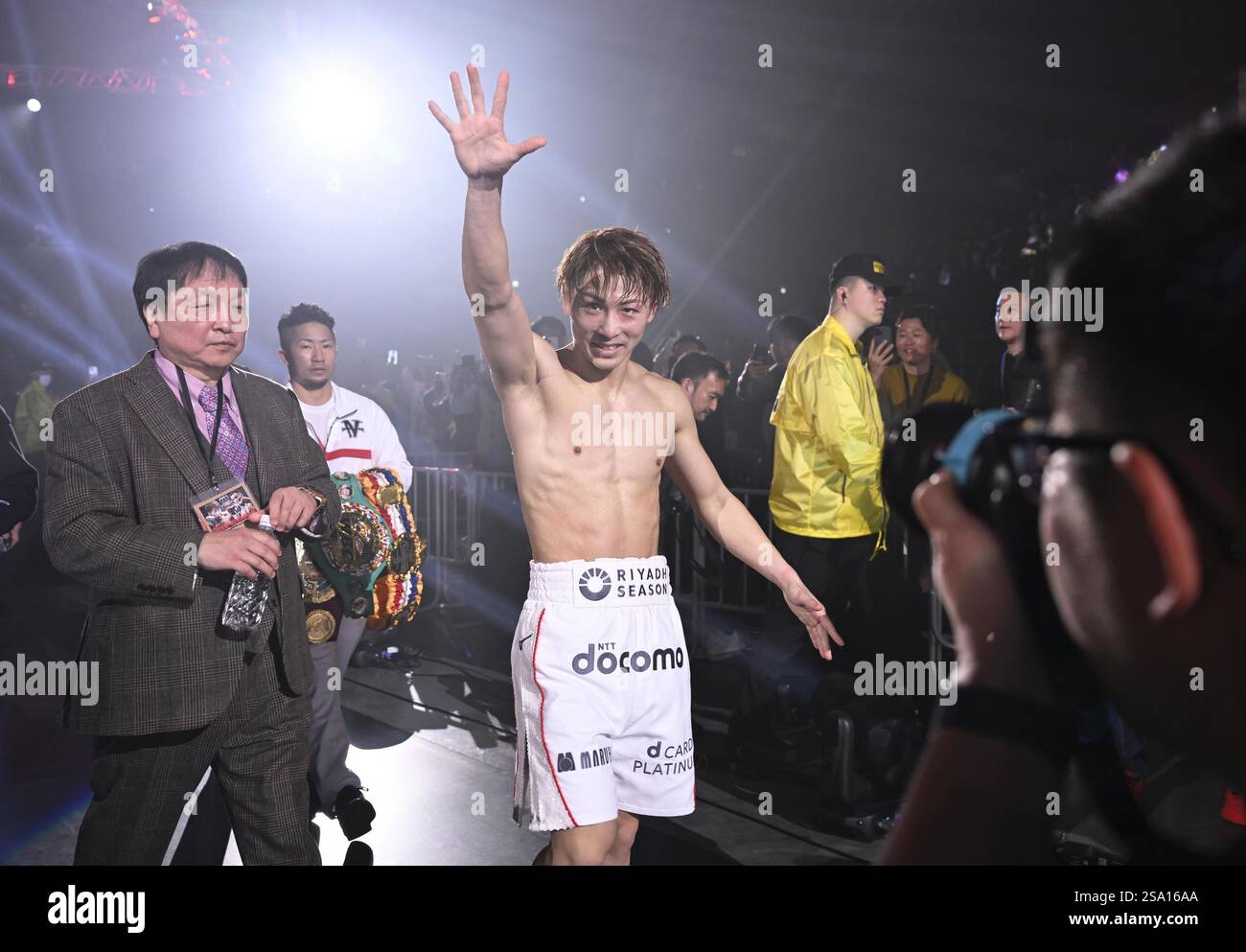Undisputed super bantamweight boxing world champion Naoya Inoue of Japan acknowledges the crowd ...