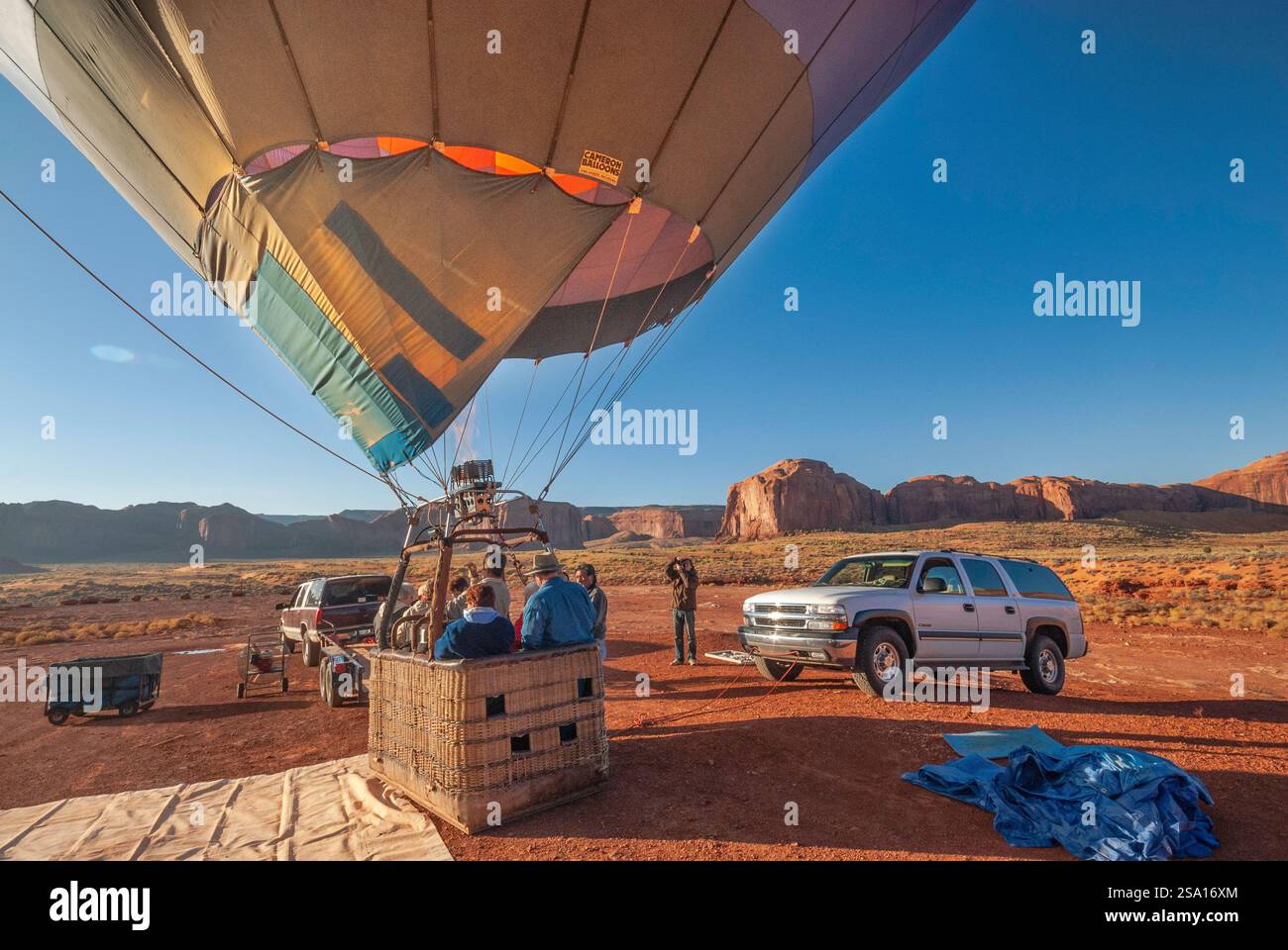 Hot Air Balloon taking off near Spearhead Mesa in Monument Valley ...