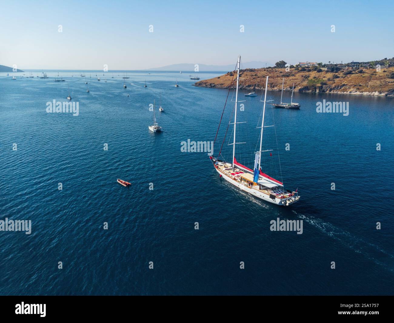 Aerial view of a white yacht crossing Bodrum Harbor, Turkey Stock Photo ...