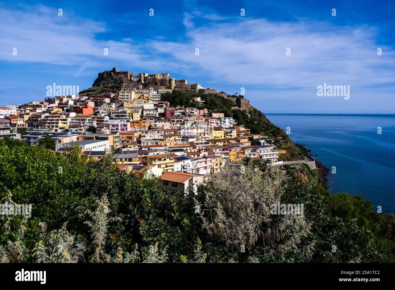 Houses in the coastal town of Castelsardo, grouped around a hill with ...