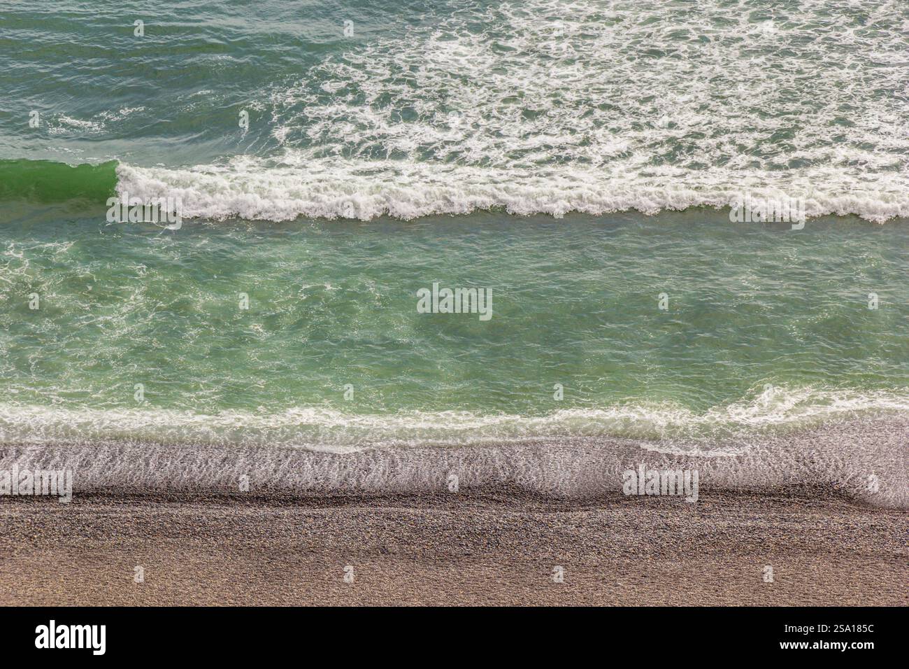 Waves on pebble beach - Miraflores, Lima, Peru Stock Photo - Alamy