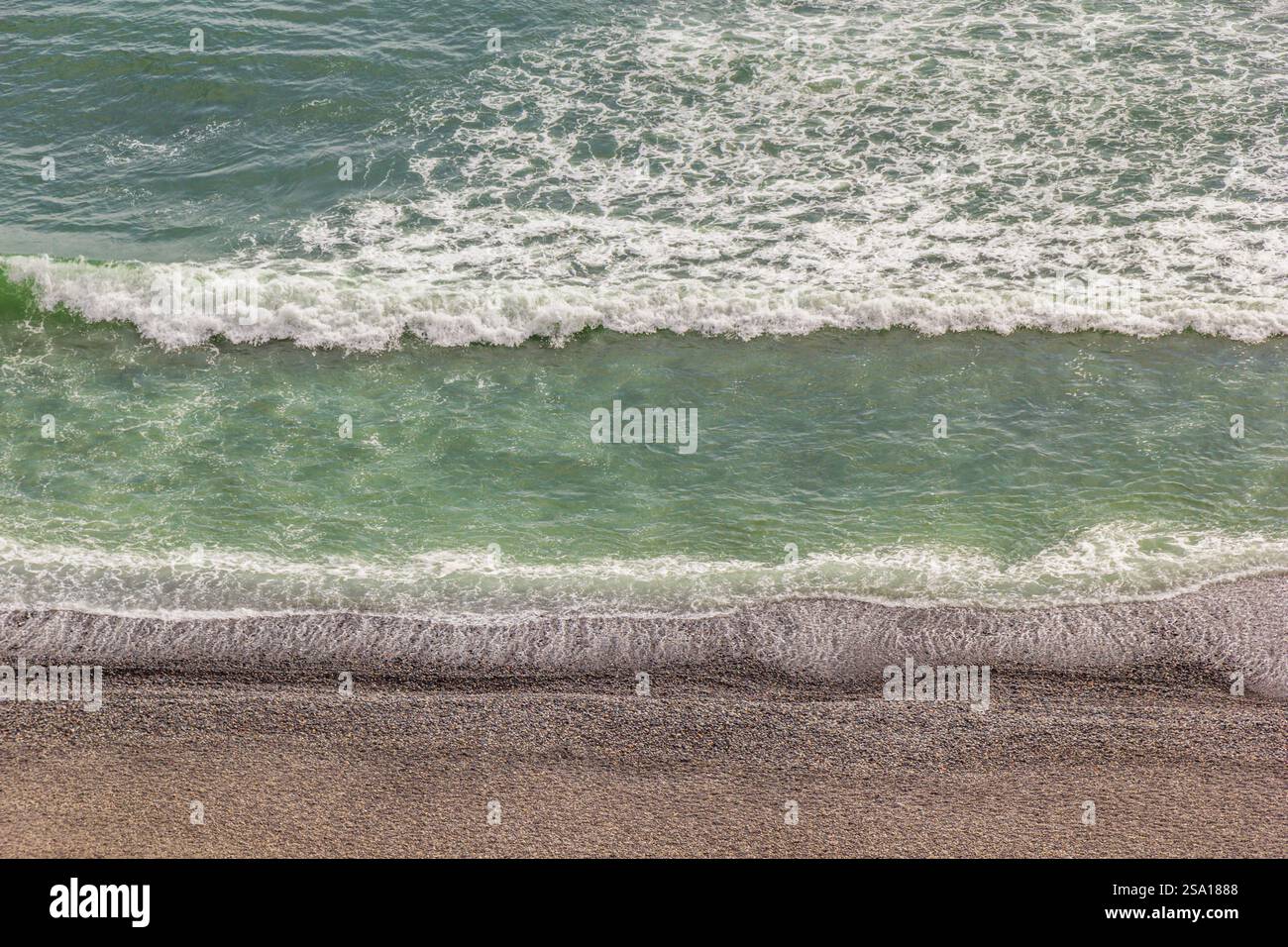 Waves on pebble beach - Miraflores, Lima, Peru Stock Photo - Alamy