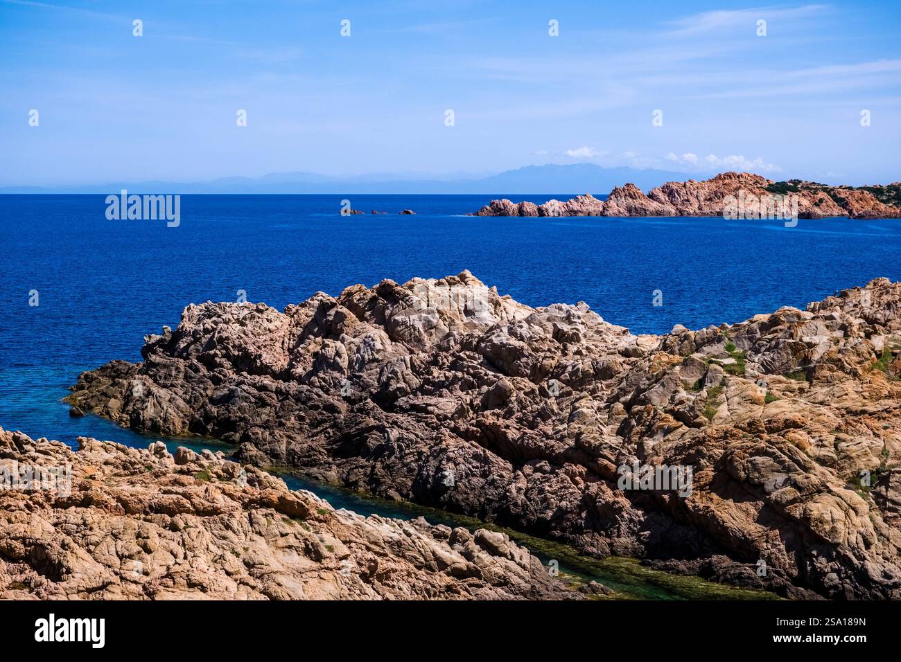 The pink-coloured granite rocks off the coast gave the small fishing ...