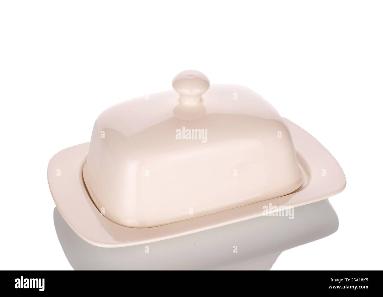 One ceramic container for butter, close-up, isolated on white ...