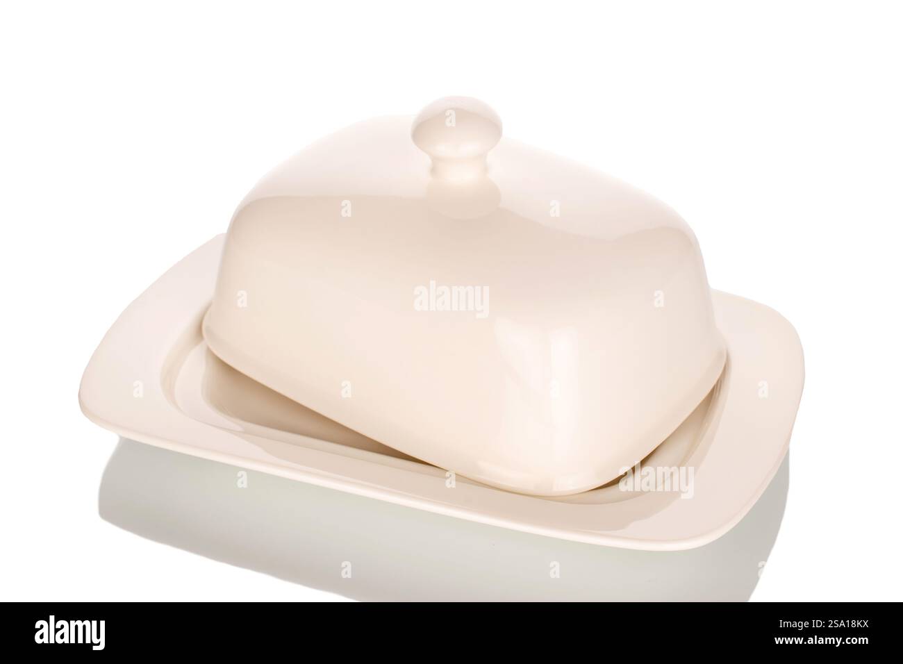One ceramic container for butter, close-up, isolated on white ...