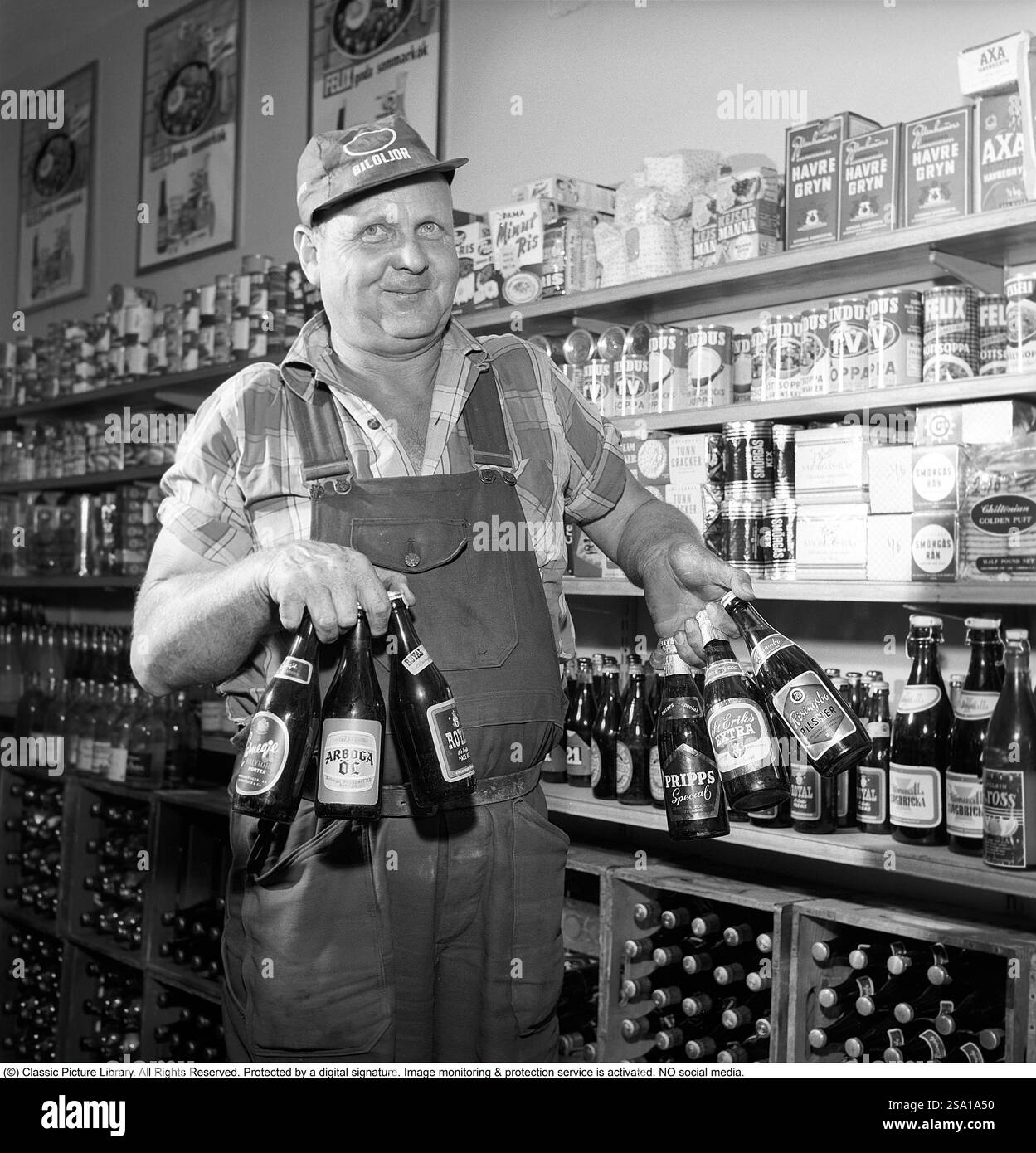 Large selection of beer and lager in 1960. A man with a good grip ...