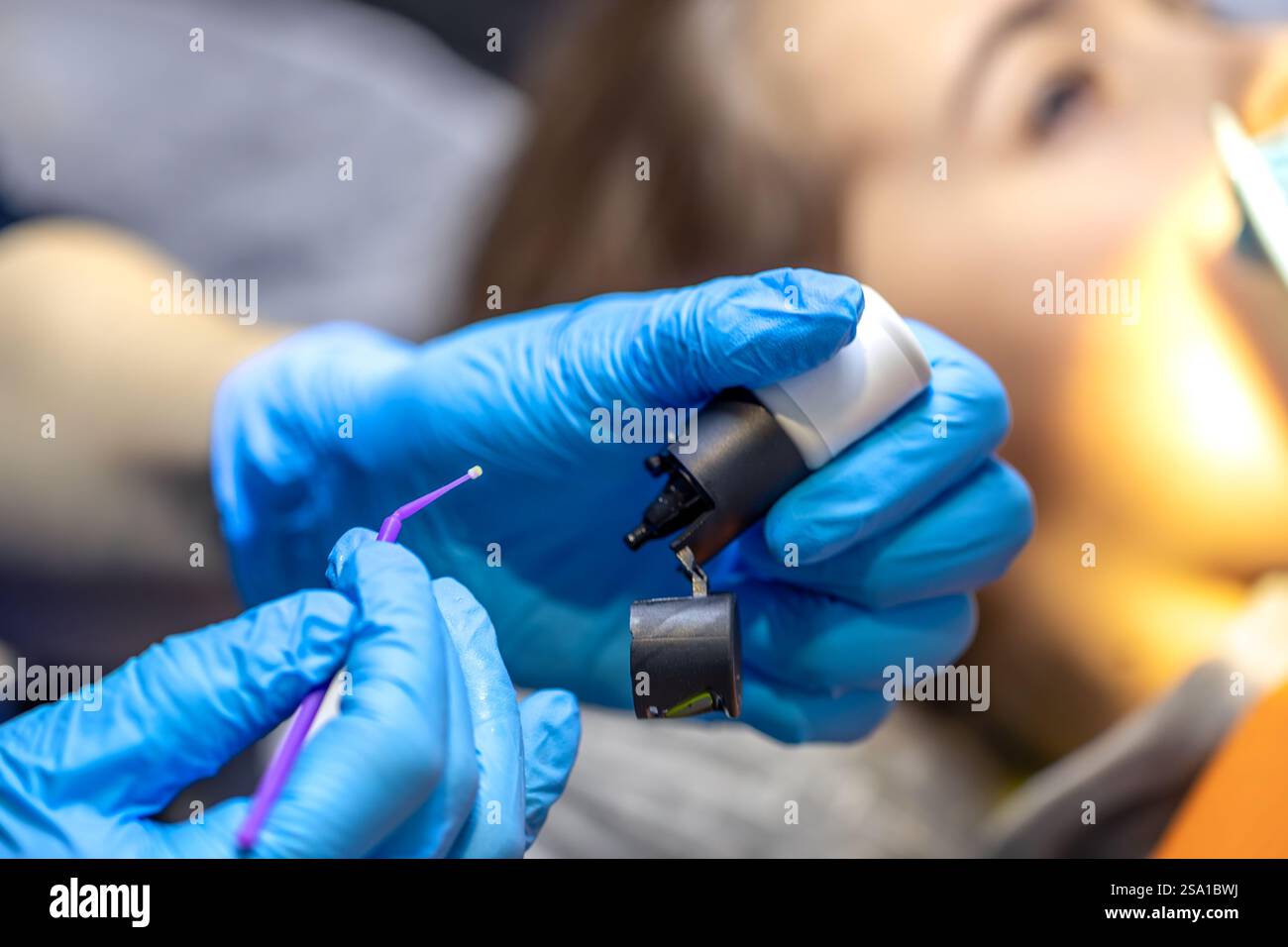 Dentist working with material for tooth treatment. Dentistry concept ...