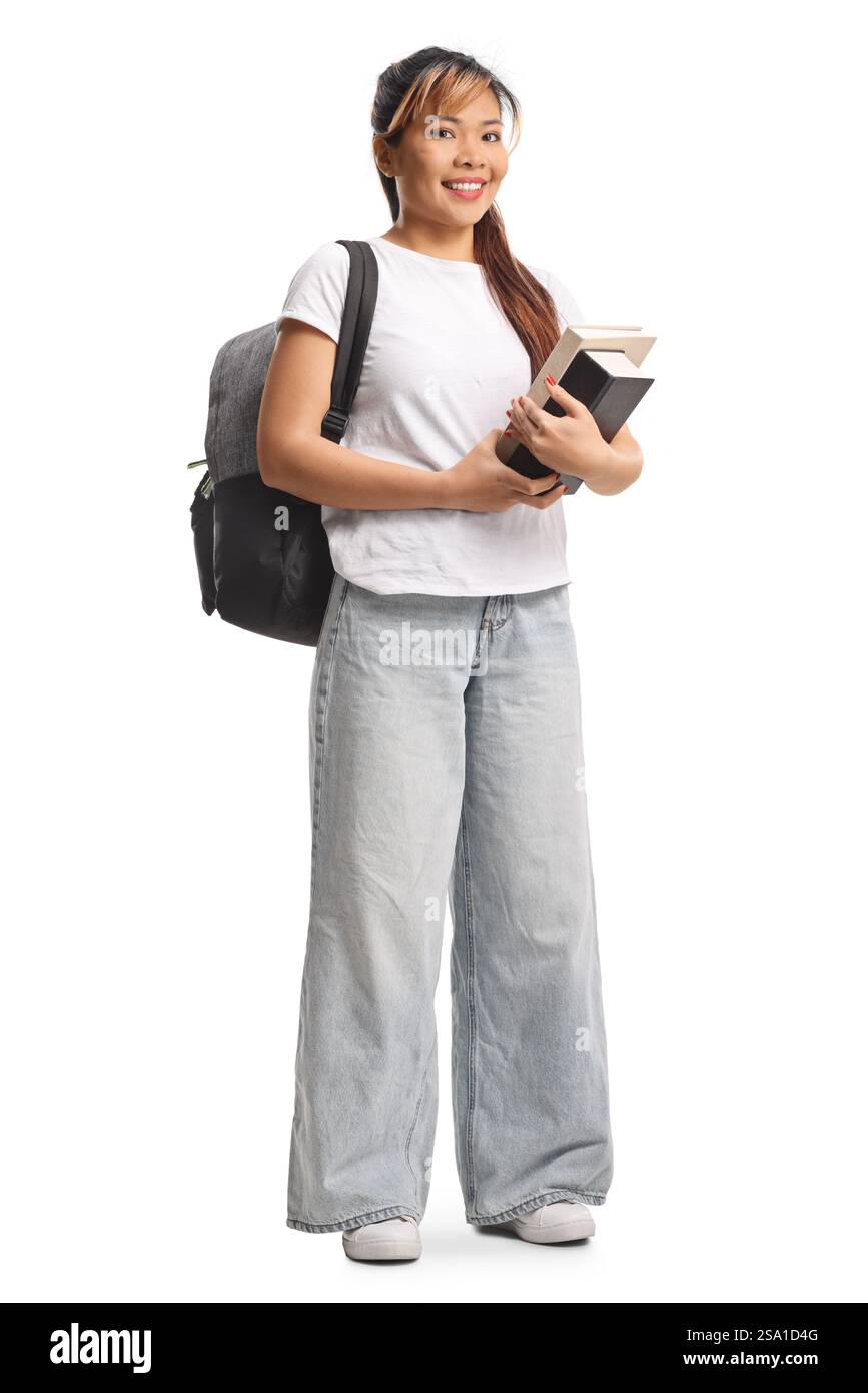 Asian female college student holding books isolated on white background ...
