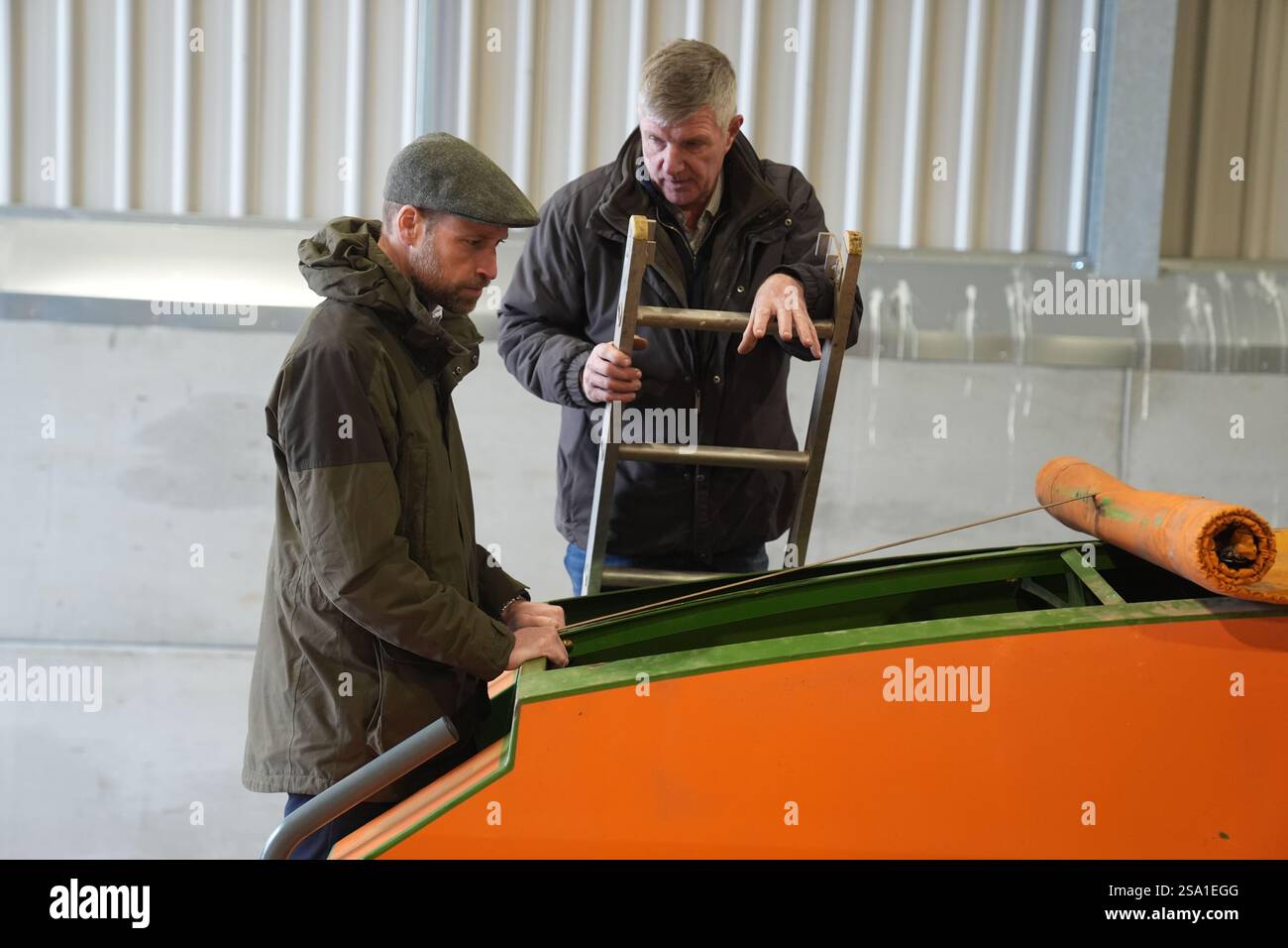The Prince of Wales being shown a seed drill during a visit to Lower ...
